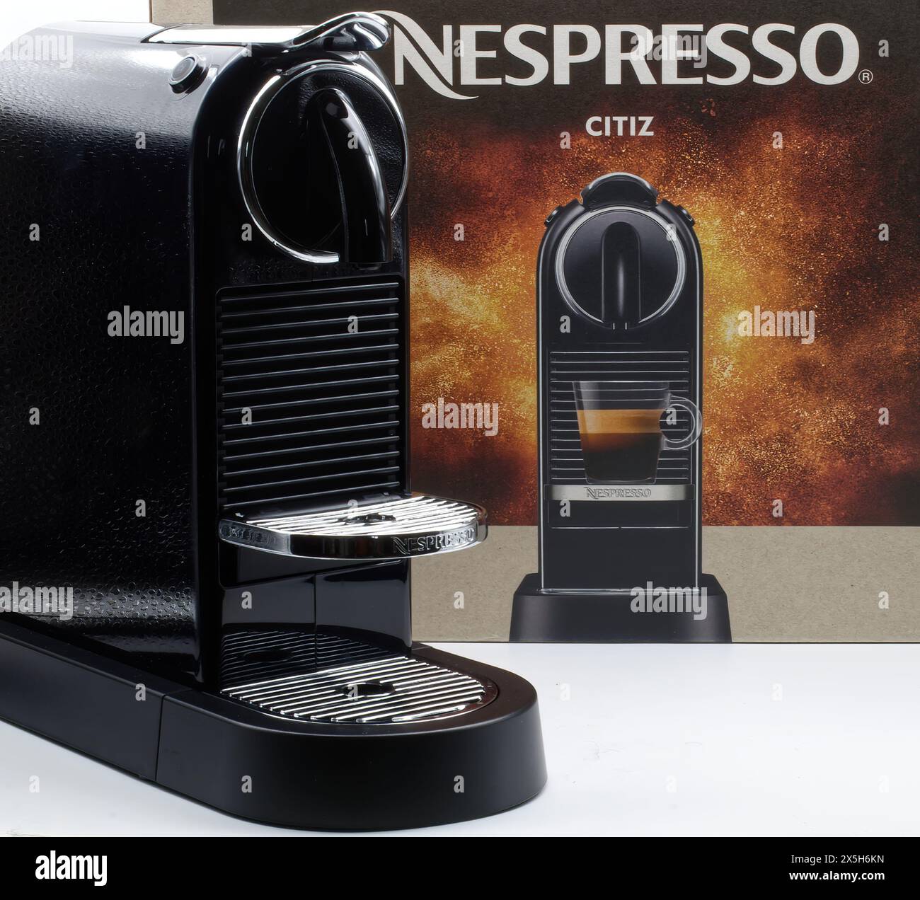 Nespresso Citiz, compact coffee machine isolated on colored background ...