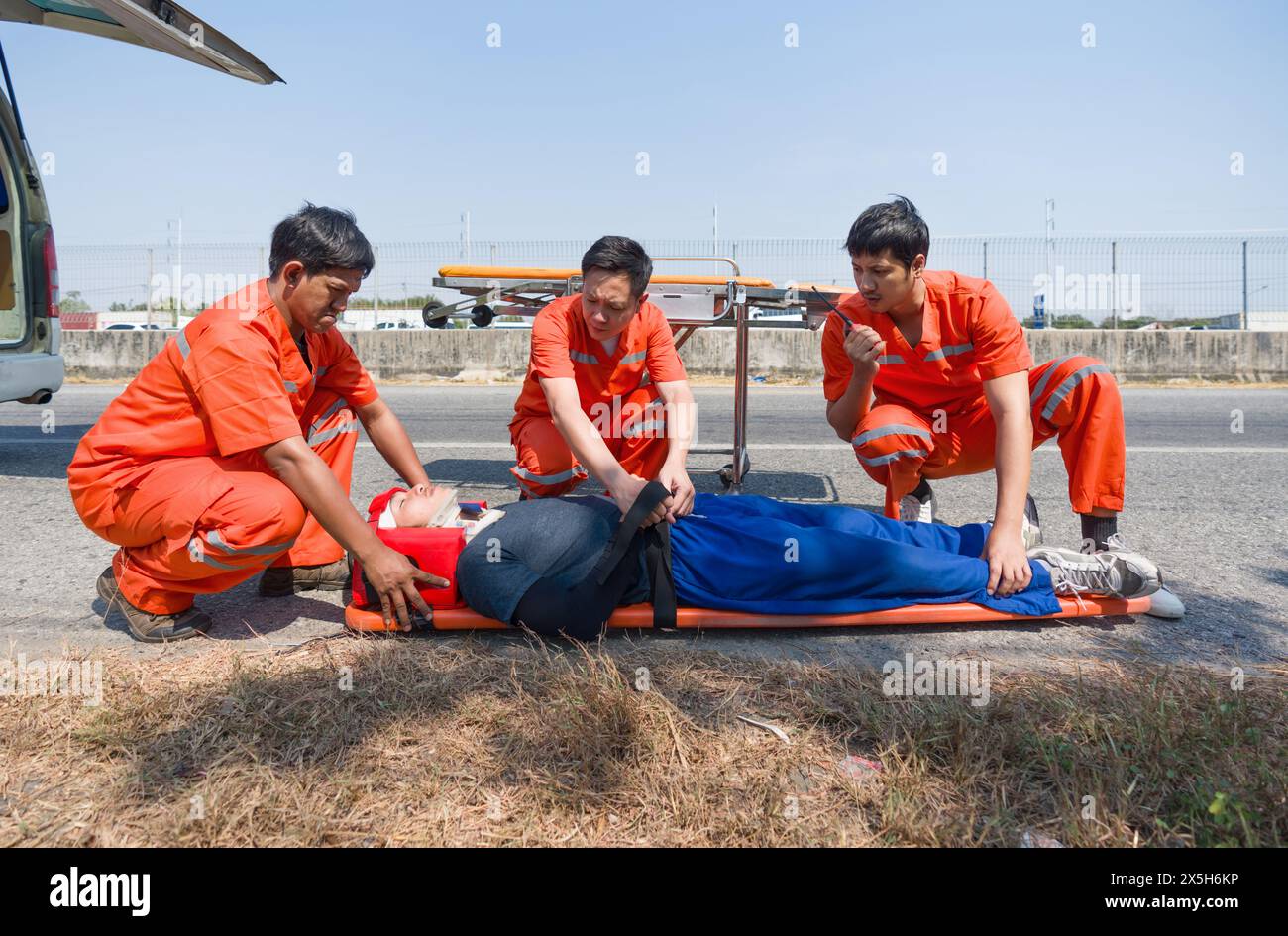 Asian beside car orange hi-res stock photography and images - Alamy