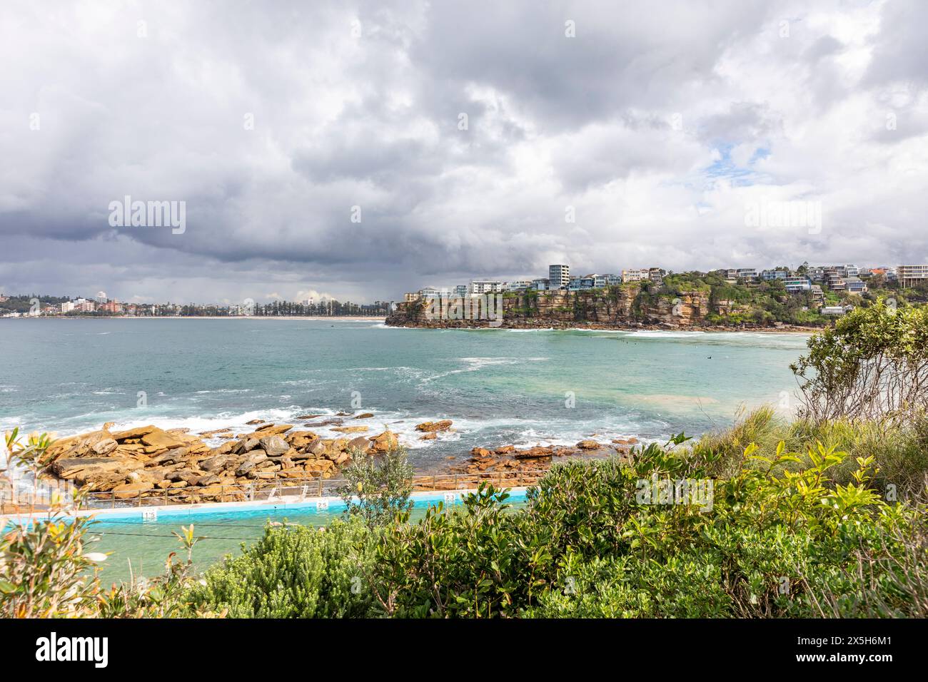 Freshwater beach ocean rock pool and view across Sydney harbour to ...