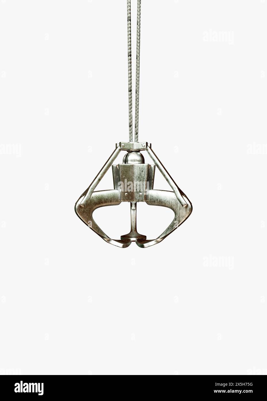 An open metal claw from a vintage arcade type grabber game connected to ...