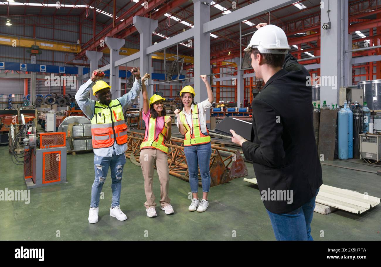 Celebrating Success. Hardhat construction worker raising their hand ...