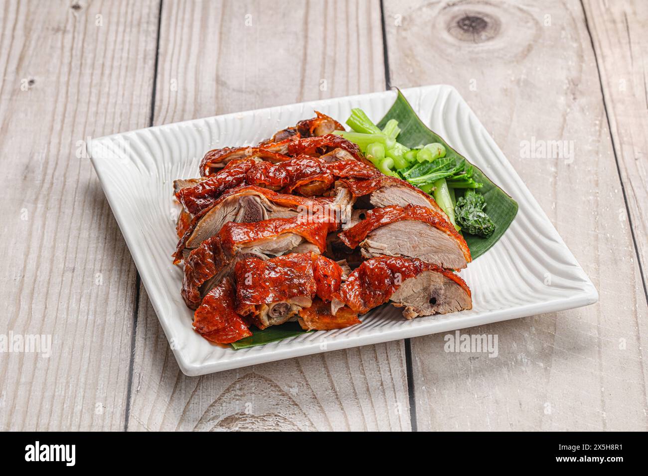 Asian cuisine - roasted duck meat with skin Stock Photo - Alamy