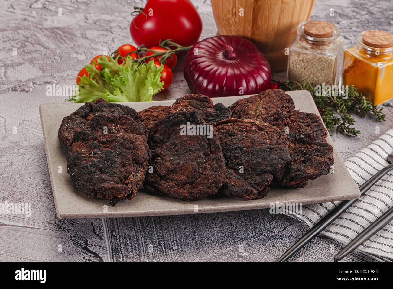Liver pancakes snack in the bowl Stock Photo - Alamy