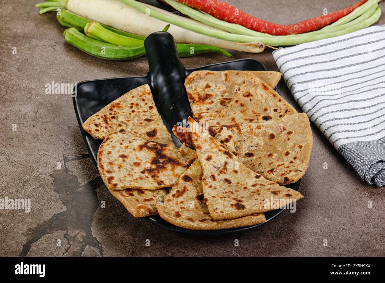 Indian vegetarian Aloo Paratha - bread with potato Stock Photo - Alamy
