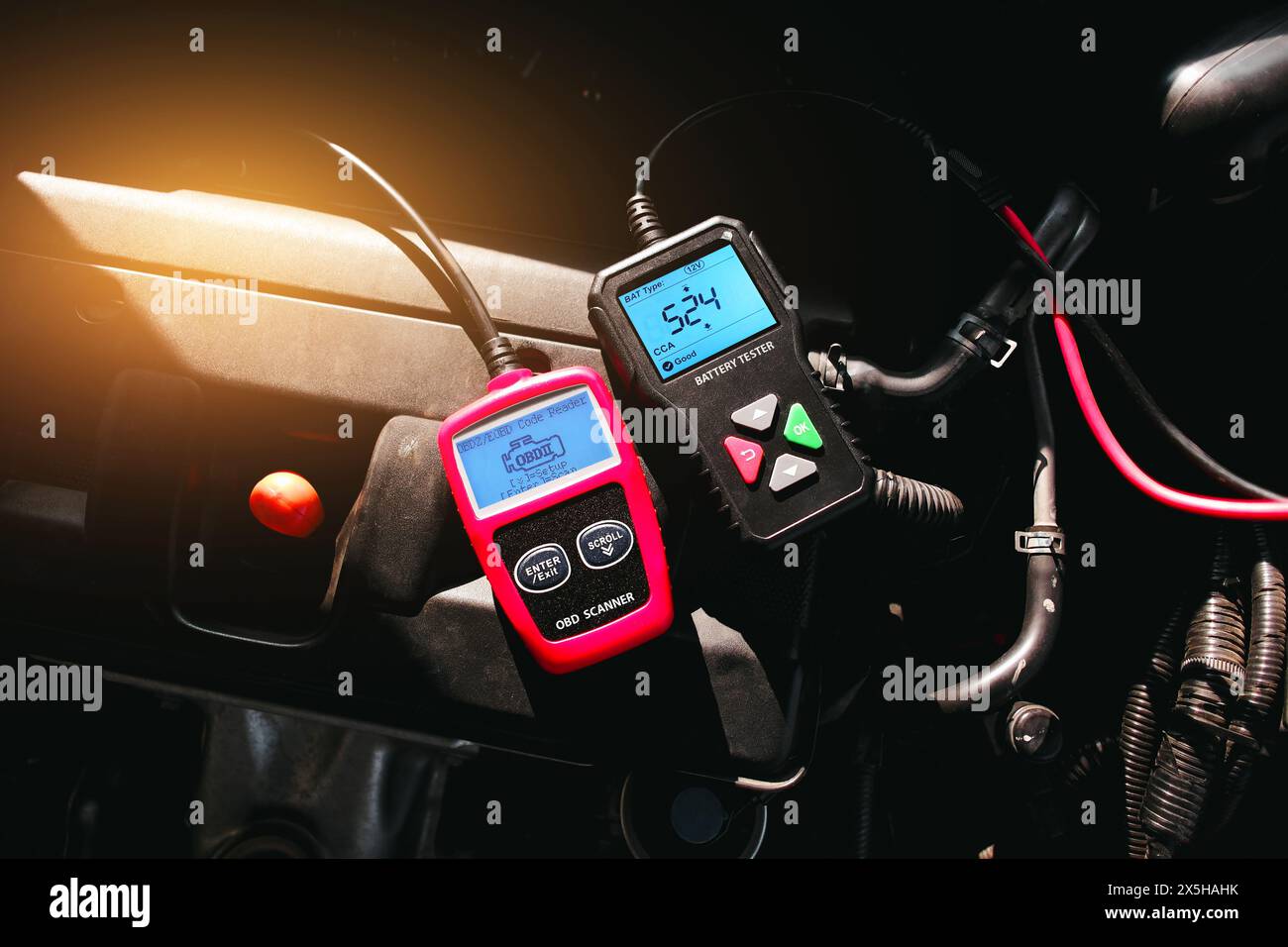 Battery tester and OBD or OBD2 scanner on engine compartment , Car ...