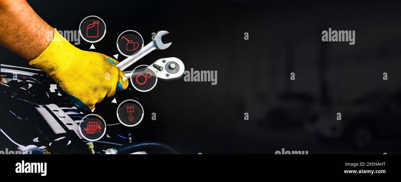 Car maintenance and servicing concept , A mechanic hand using a wrench ...