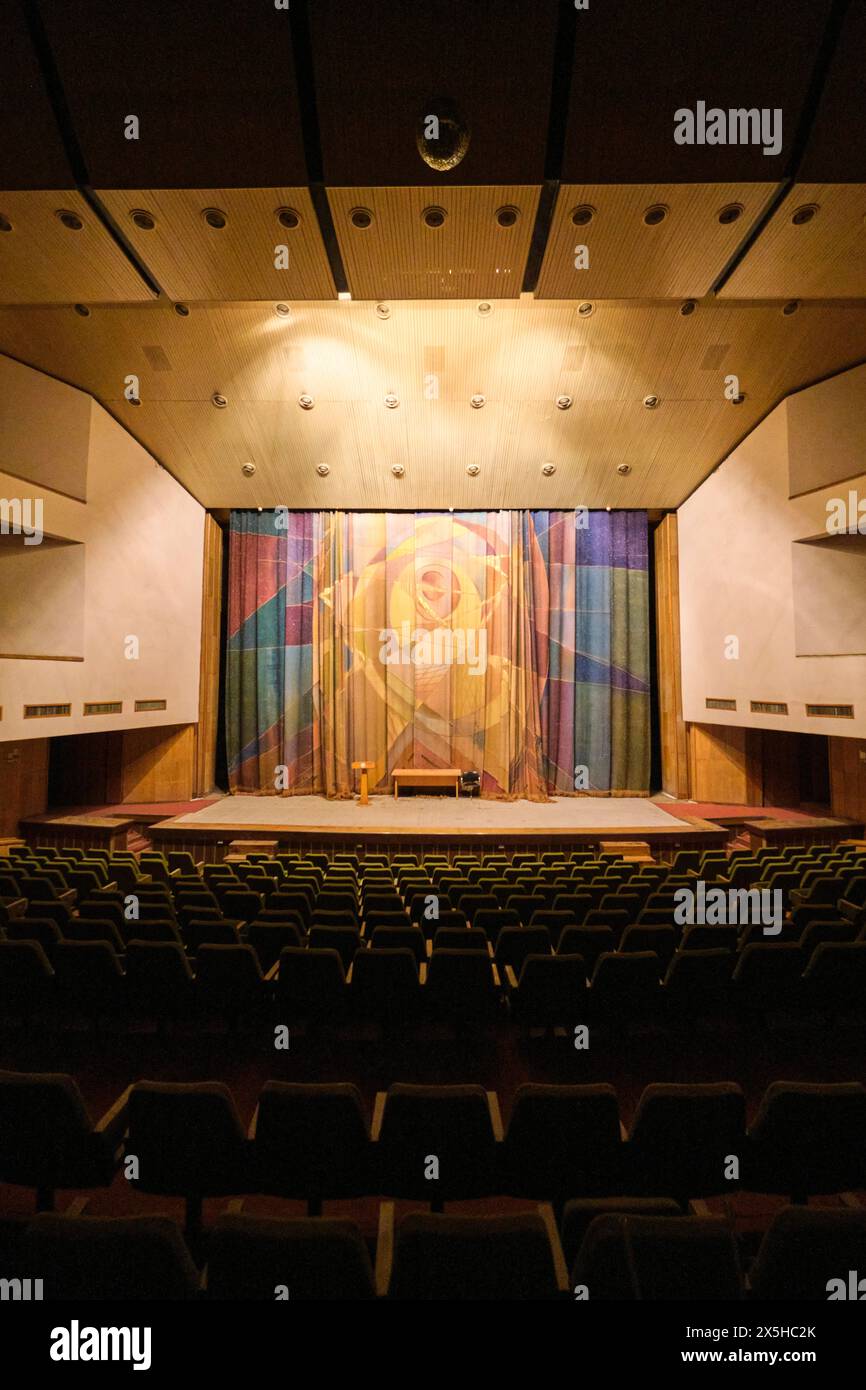View of the main auditorium with colorful curtain. At the Soviet ...