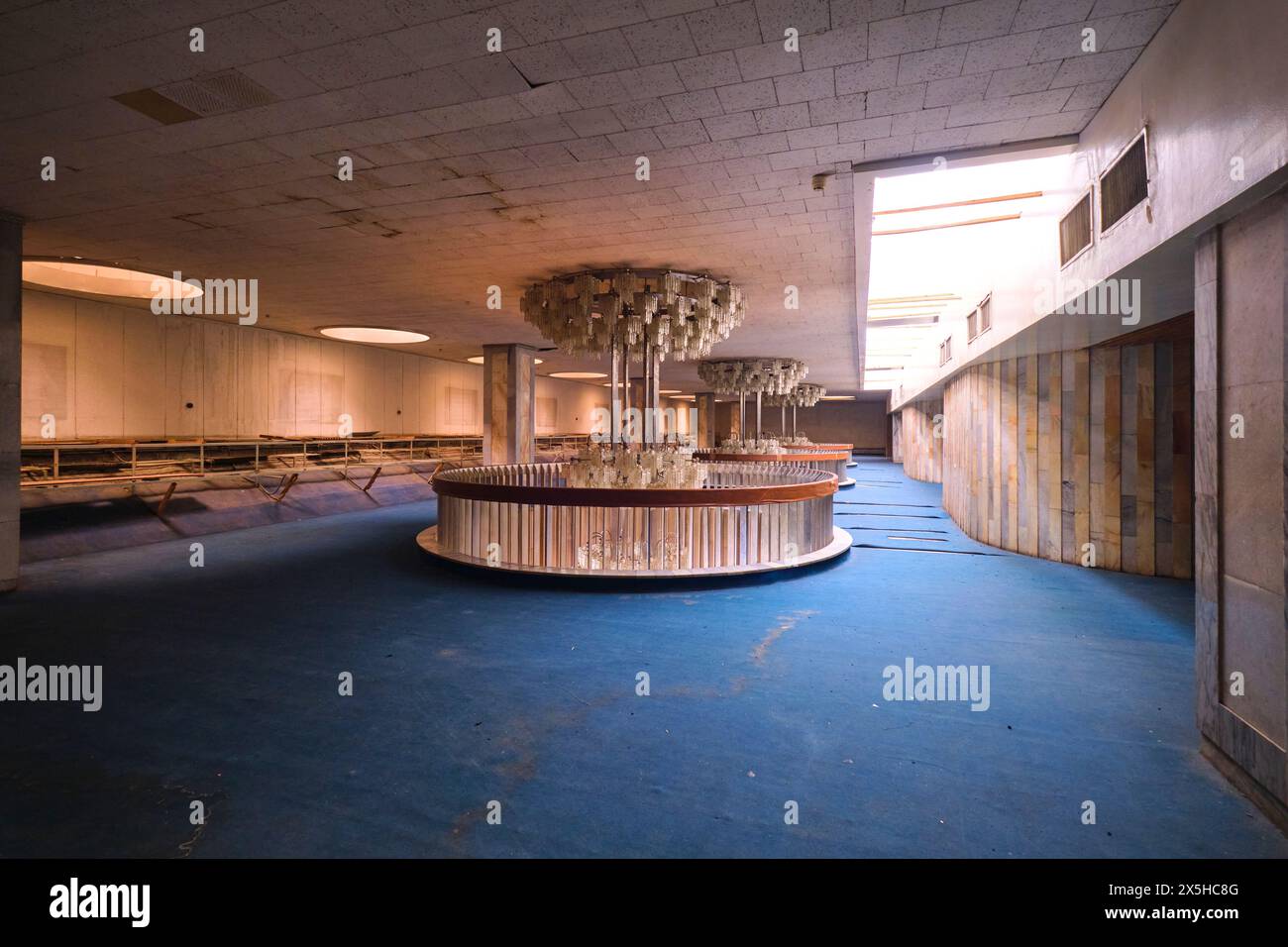 View of the upper lobby with holes for hanging, huge, glass chandeliers ...