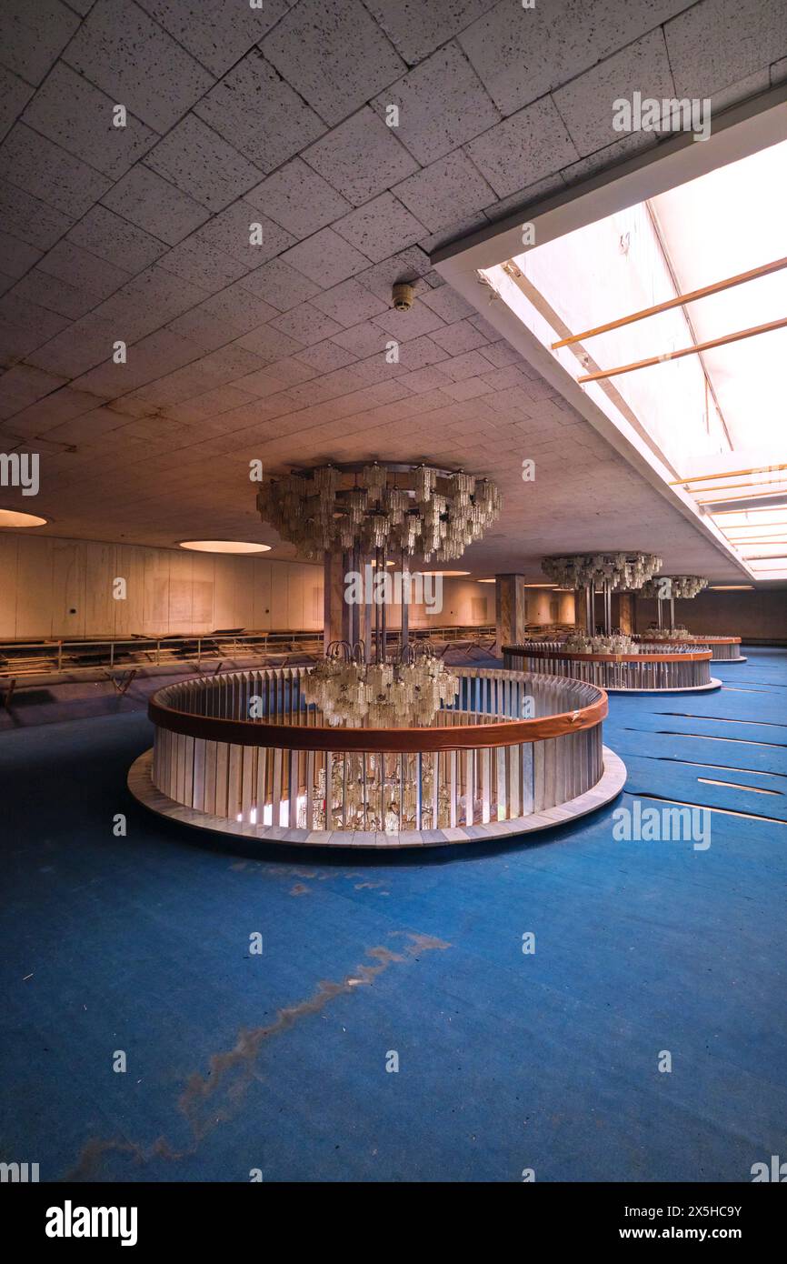 View of the upper lobby with holes for hanging, huge, glass chandeliers ...