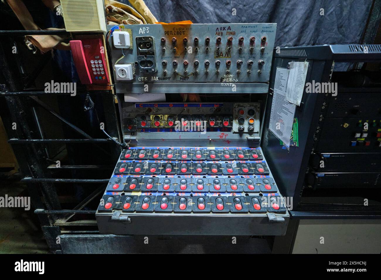 A view of the old, Soviet, electronic lighting control board backstage ...