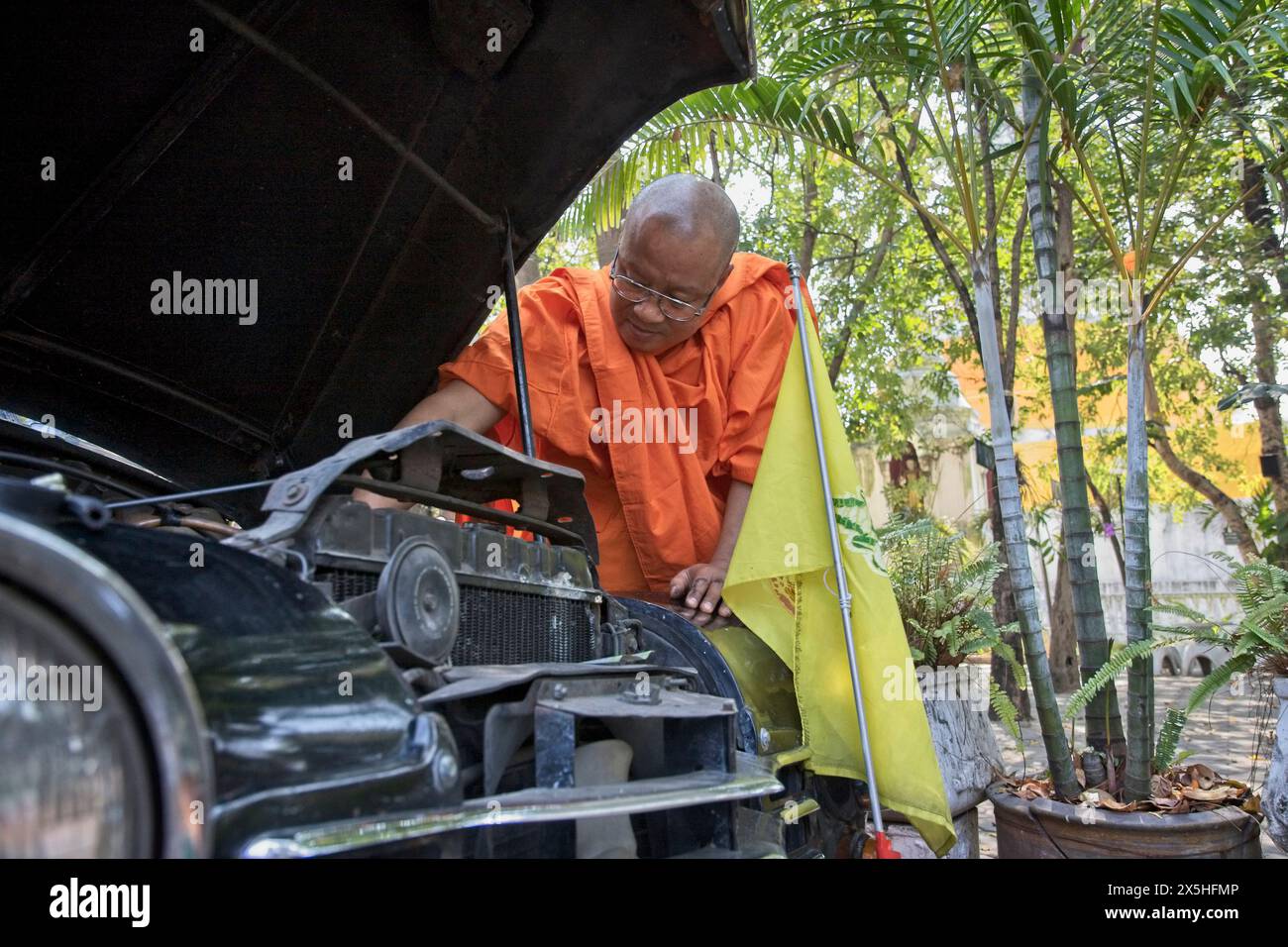 Thailand, Chiangmai; 24 January 2008, Buddhist monk trying to fix the ...