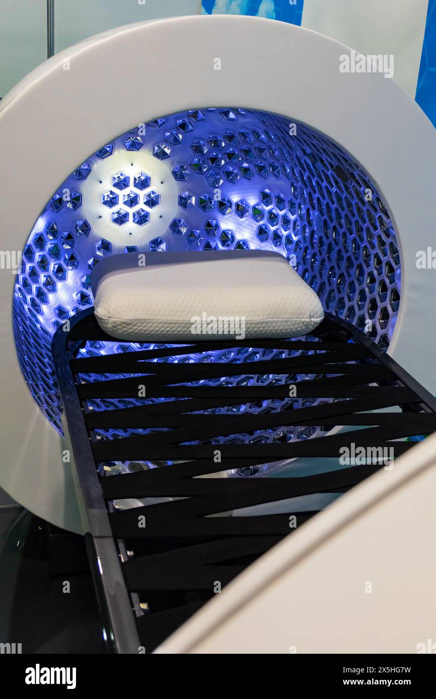Vertical solarium in the shape of a futuristic capsule chair with LED ...