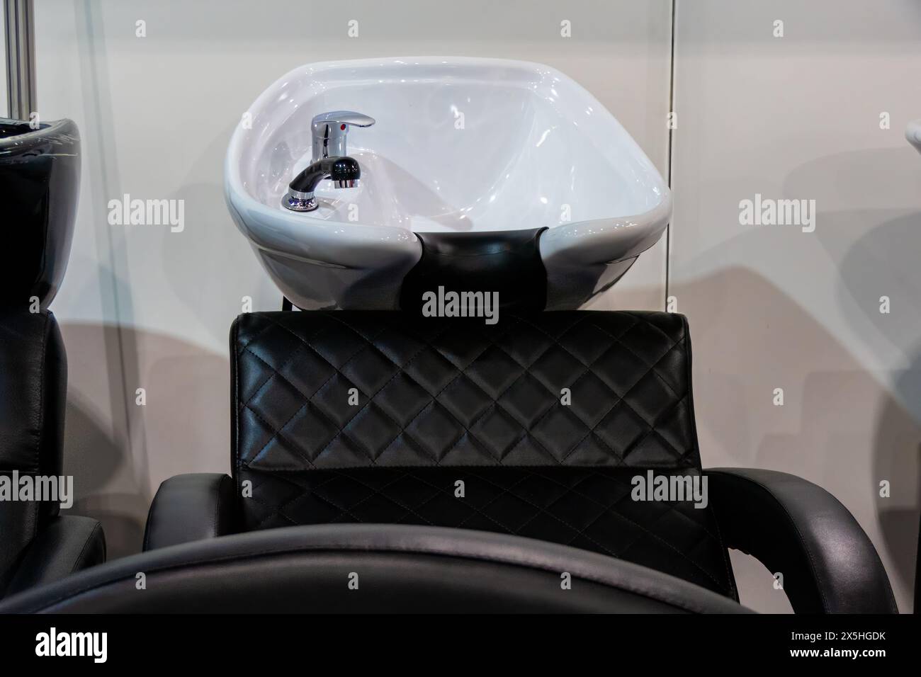 Hair wash sink and beauty salon chair. This is a professional and ...