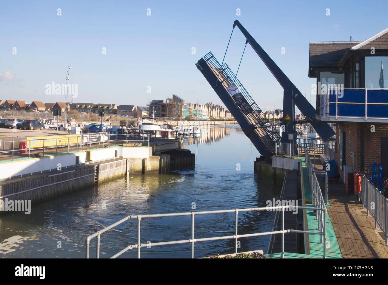 lock gates open at the entrance to Chatham marina on the kent coast ...