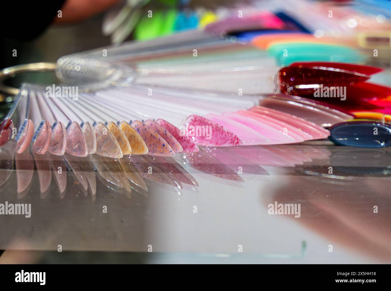 Samples of nail polish of different colors and shades applied to the ...