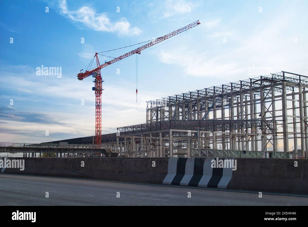 the tower crane at construction site standby for lifting work among the ...