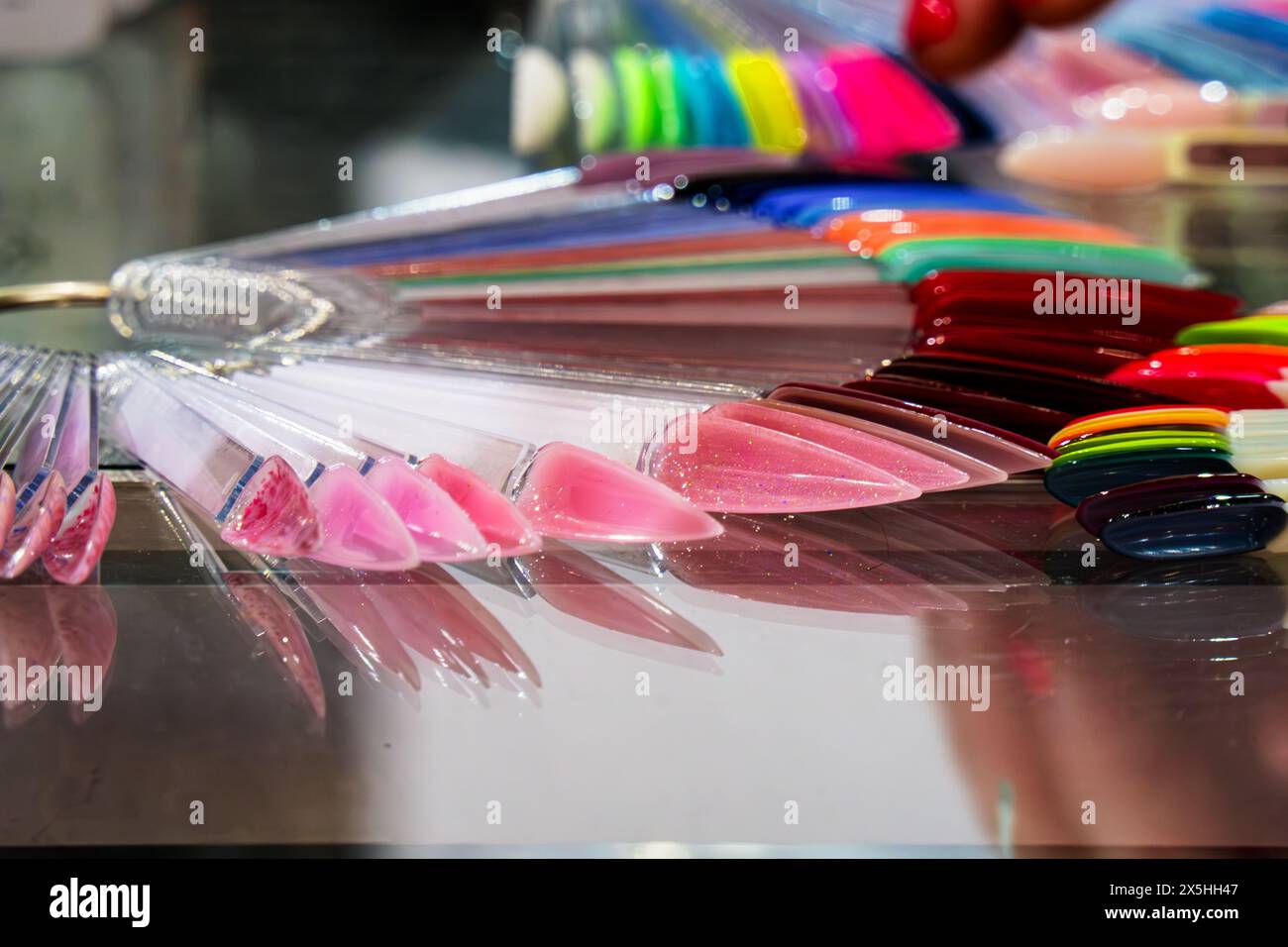 Samples of nail polish of different colors and shades applied to the ...