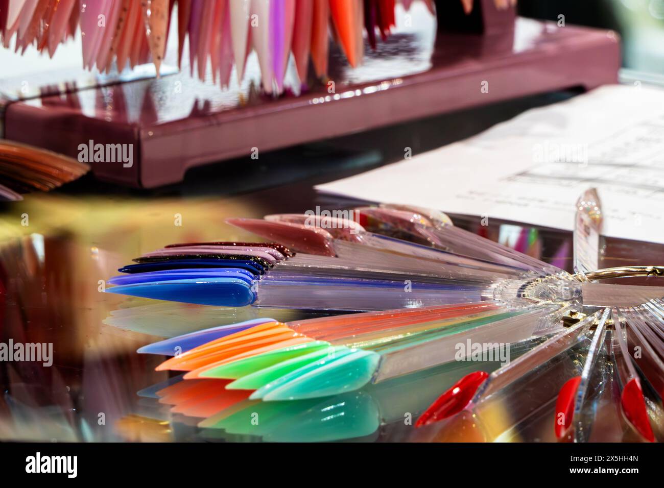 Samples of nail polish of different colors and shades applied to the ...