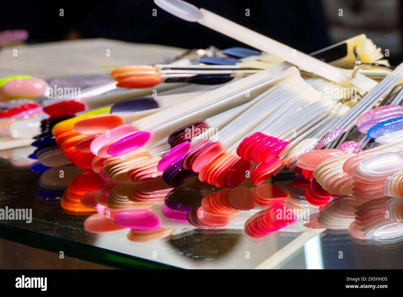 Samples of nail polish of different colors and shades applied to the ...