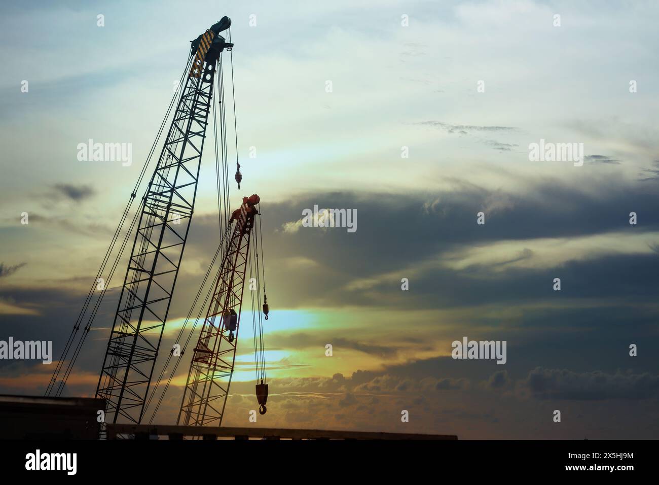 the tower crane hoisting, mobile crane lifting, and jib boom of the ...