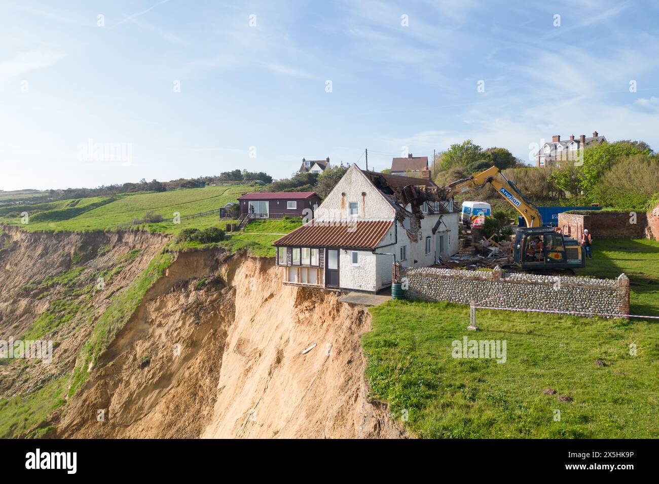 Demolition workers tear down Cliff Farm in Trimingham, Norfolk, which ...