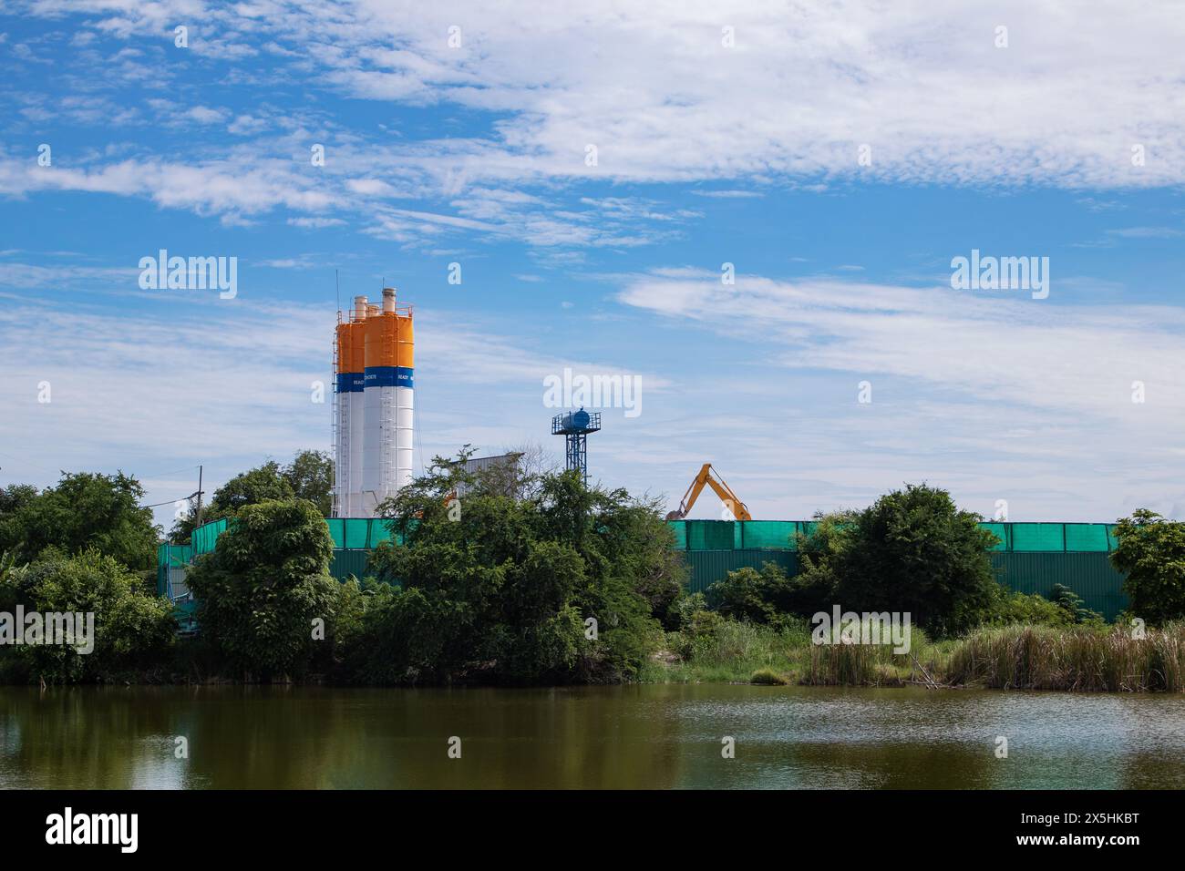 observes far from the concrete mixing plant. there is a concrete tank ...