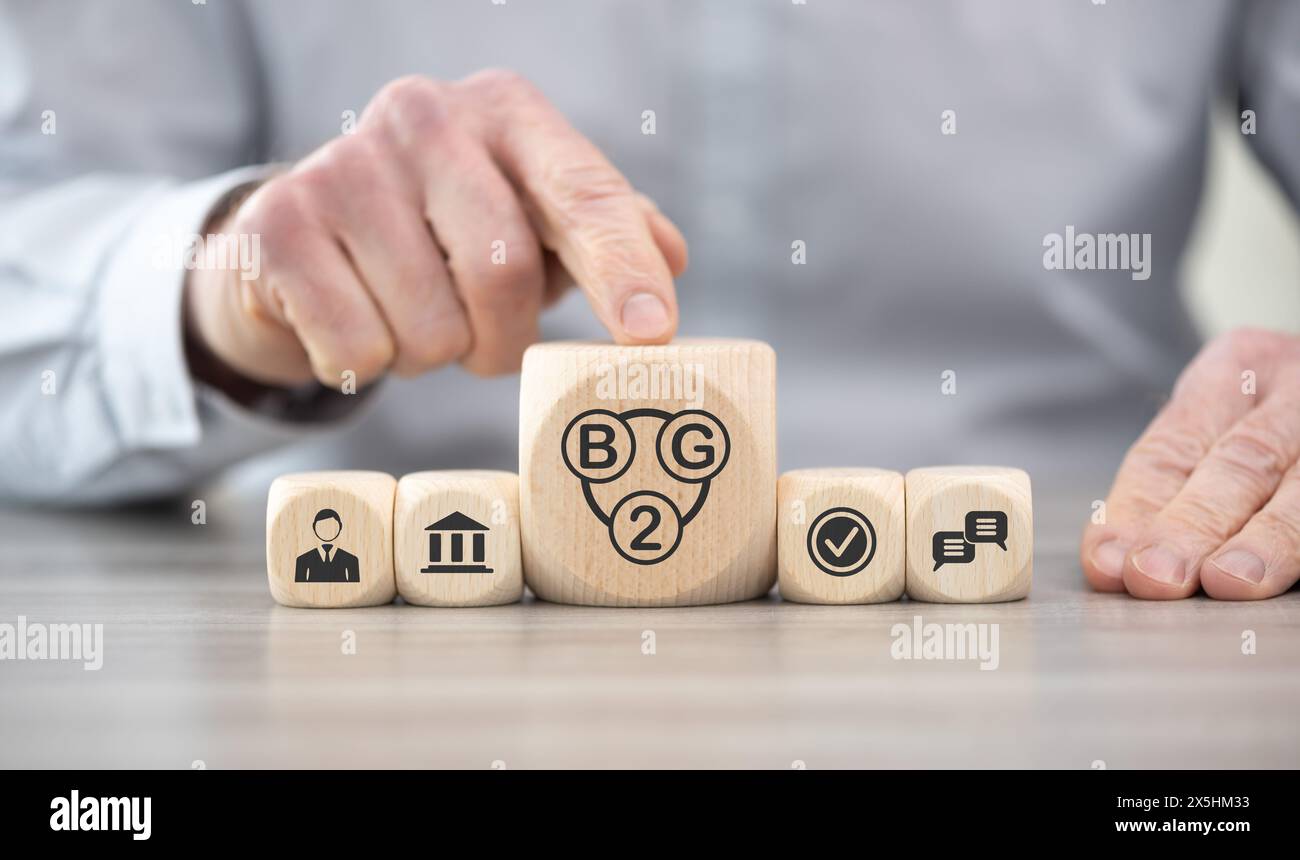 Wooden blocks with symbol of b2g concept Stock Photo - Alamy