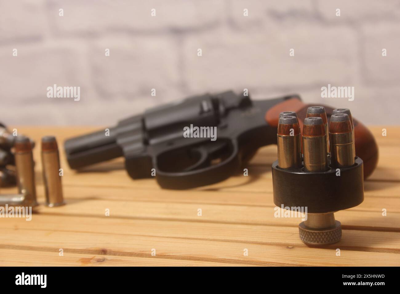 Vintage Revolver Gun With Ammo and Speed Loader Stock Photo - Alamy