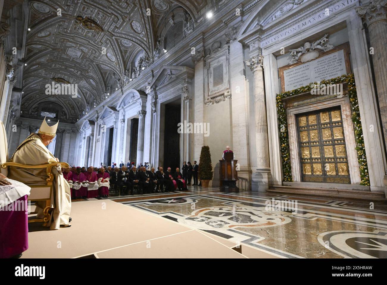 Pope Francis, in front of the Holy Door, solemnly proclaims the ...