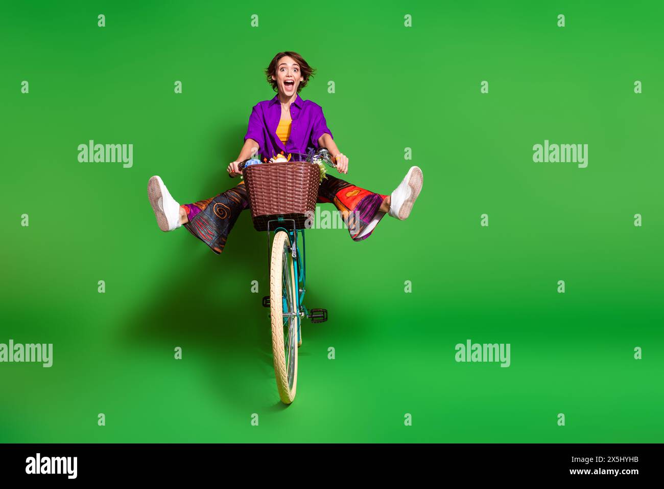 Photo of funny screaming young woman wear purple shirt and brown bob ...