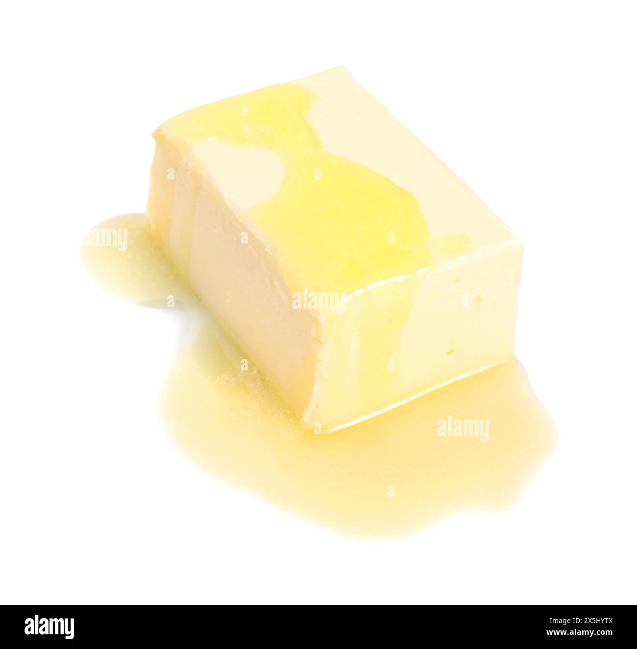 Piece of melting butter on white background Stock Photo - Alamy