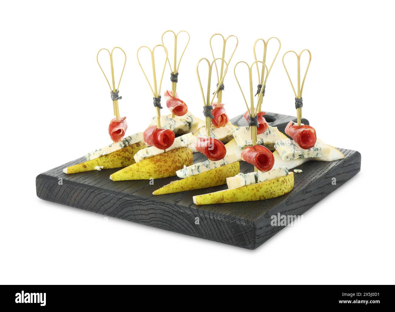 Tasty canapes with pears, blue cheese and prosciutto isolated on white ...