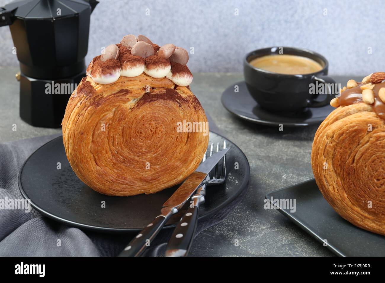 Crunchy round croissants served on grey table. Tasty puff pastry Stock ...