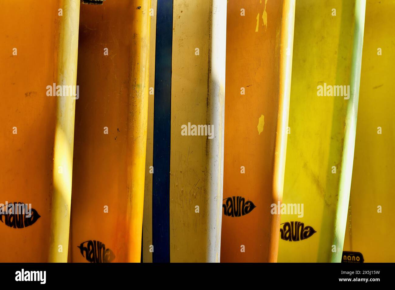 Colorful surfboards drying on Bali beach Stock Photo - Alamy