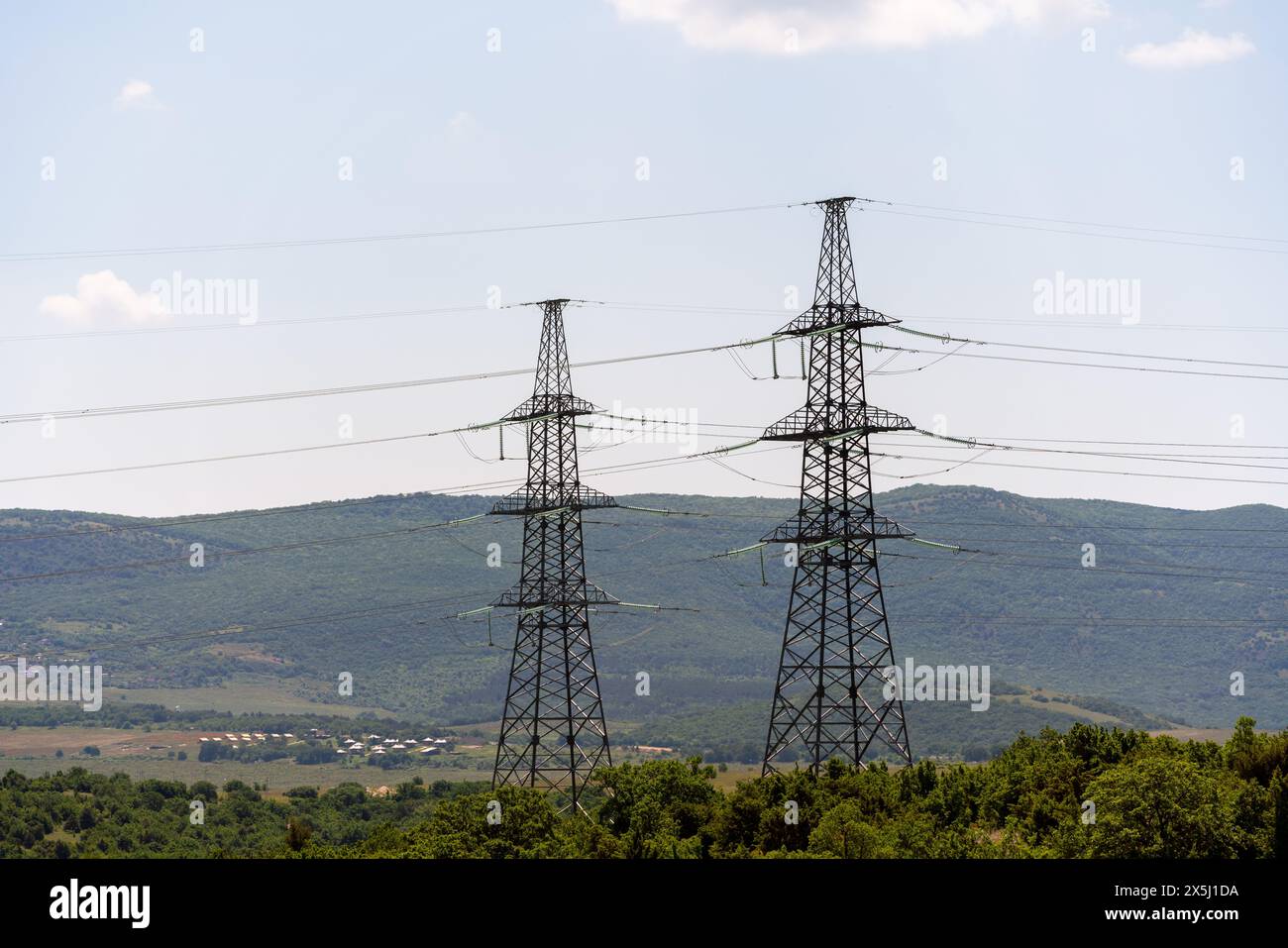 High voltage towers Electric pole. Power line support with wires for ...