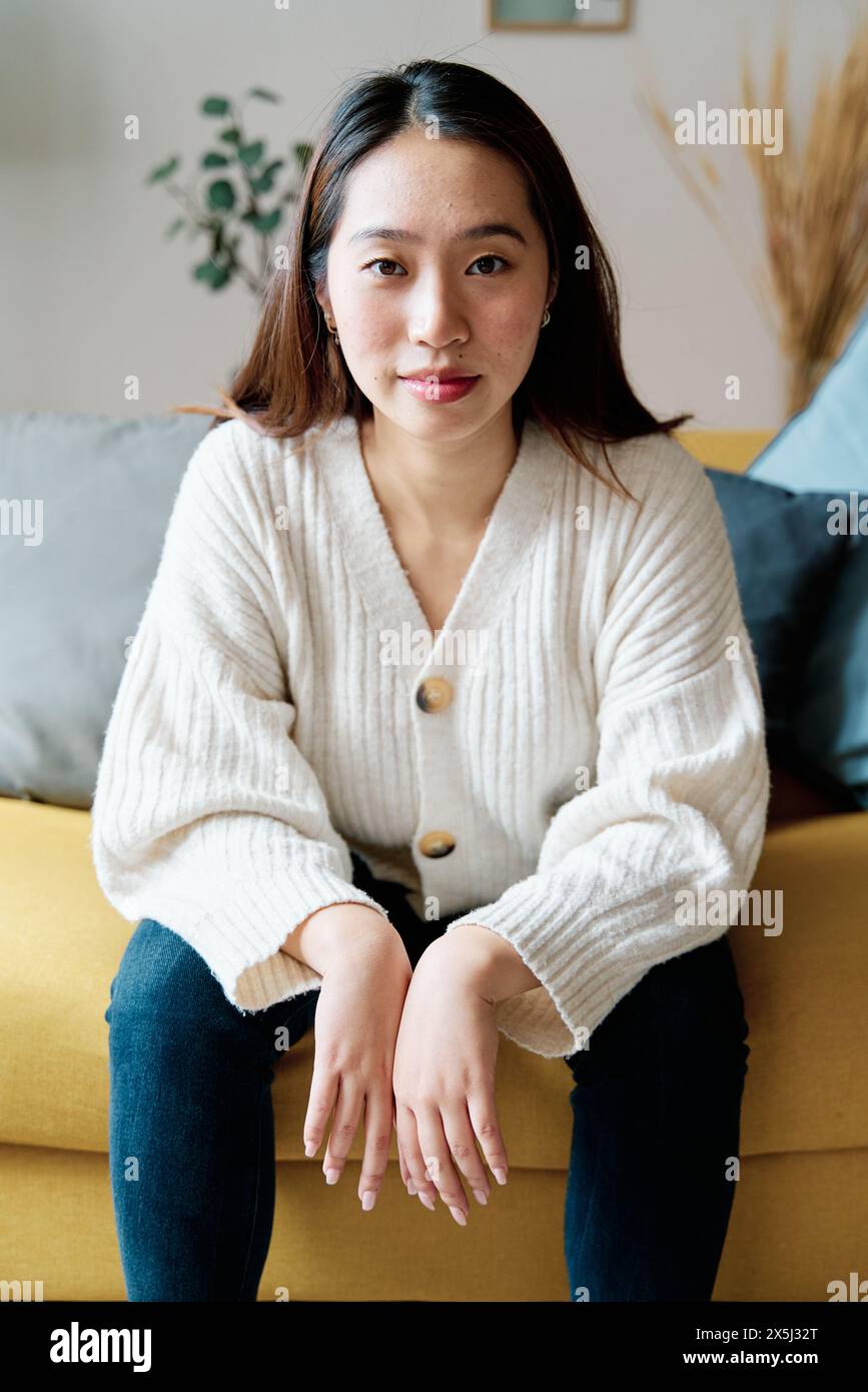 Woman relaxing comfortably on living hi-res stock photography and ...