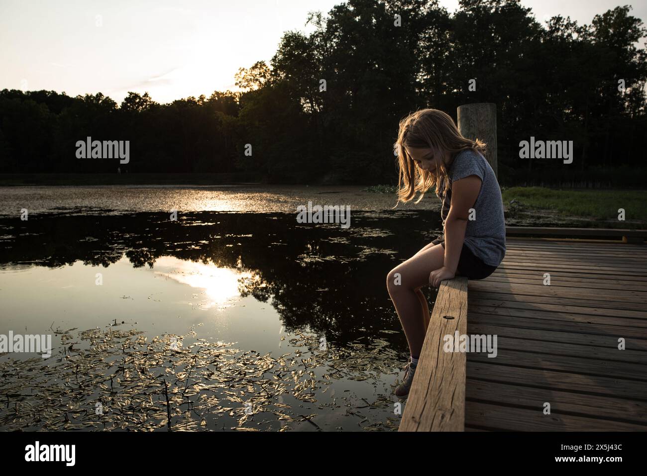 Girl on the dock hi-res stock photography and images - Alamy