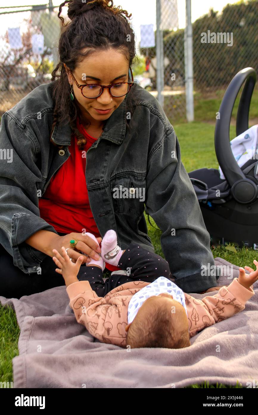 Mother tenderly nurturing hi-res stock photography and images - Alamy