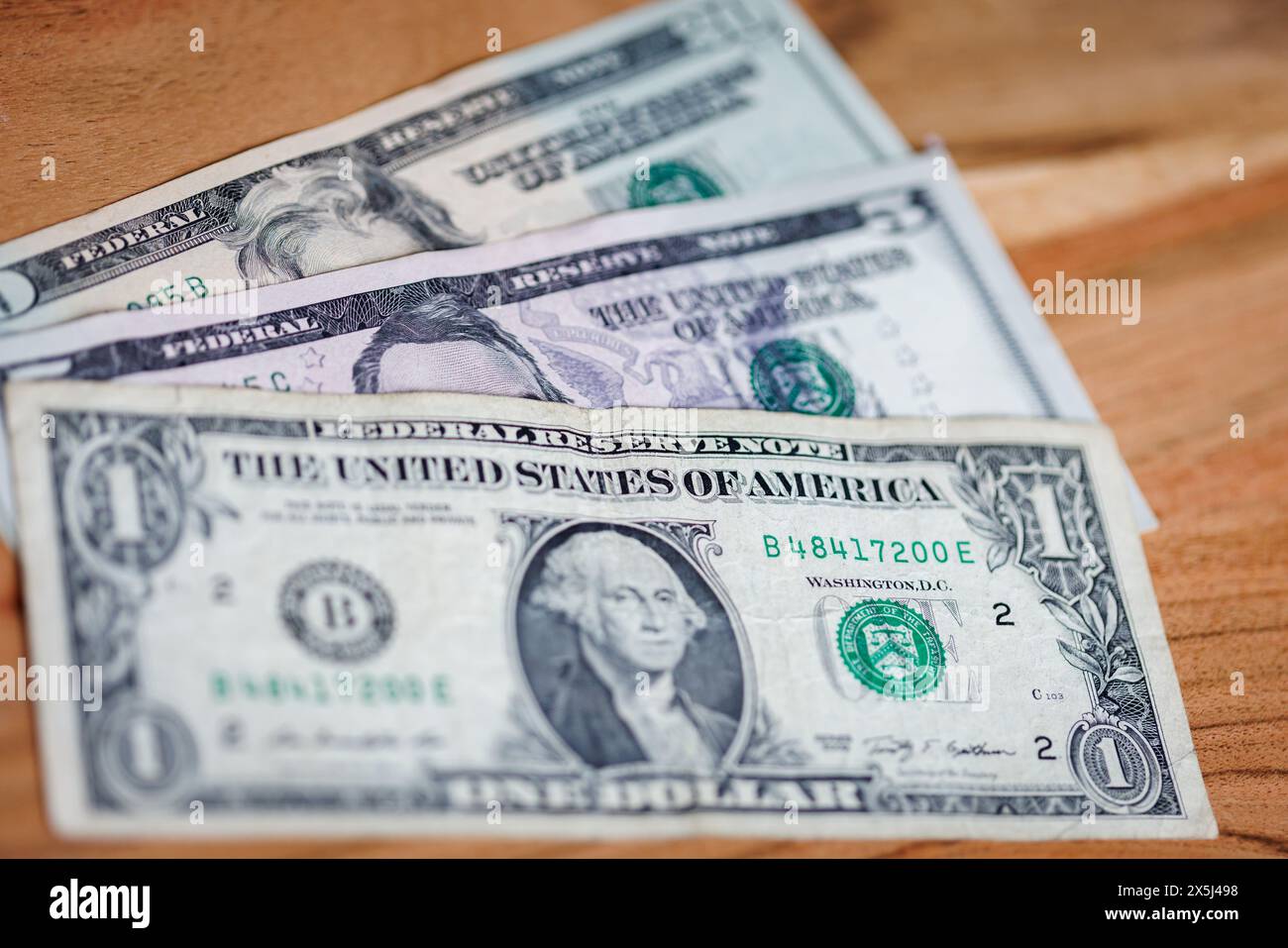 Nuremberg, Germany. 22nd Apr, 2024. ILLUSTRATION - A one-dollar bill, a ...