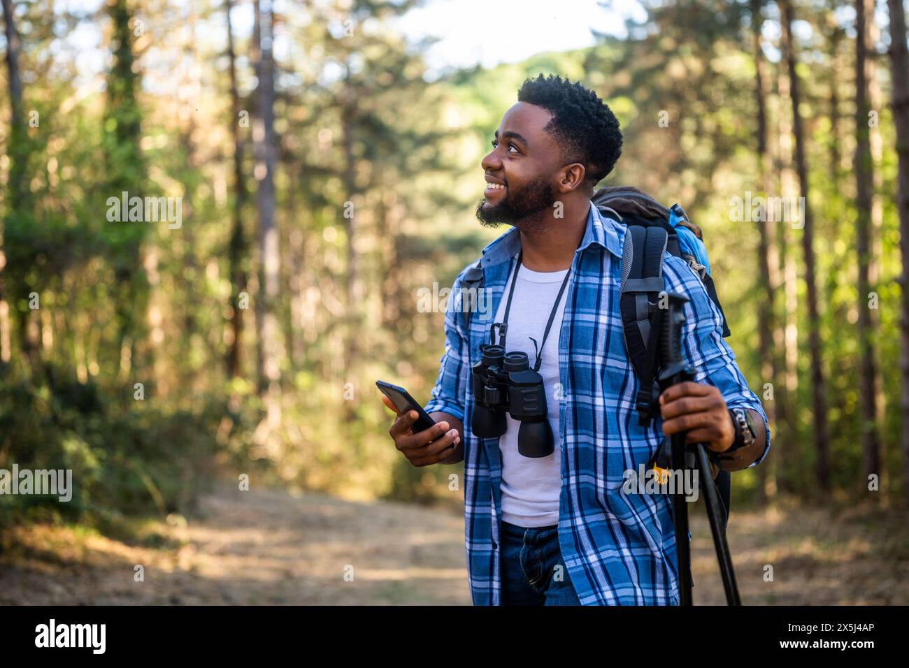 African american man hiking using hi-res stock photography and images - Alamy