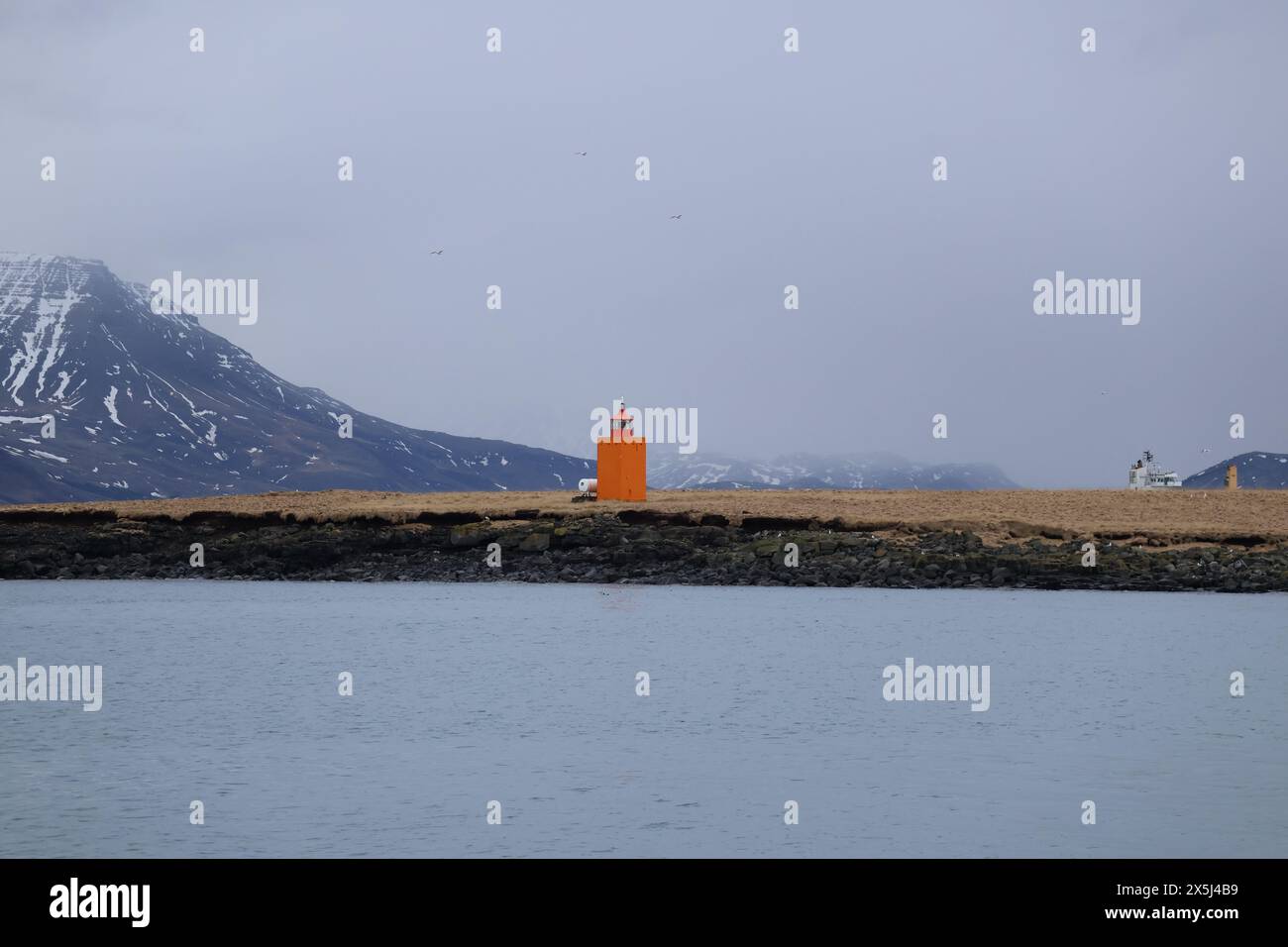 Orange lighthouse in iceland hi-res stock photography and images - Alamy