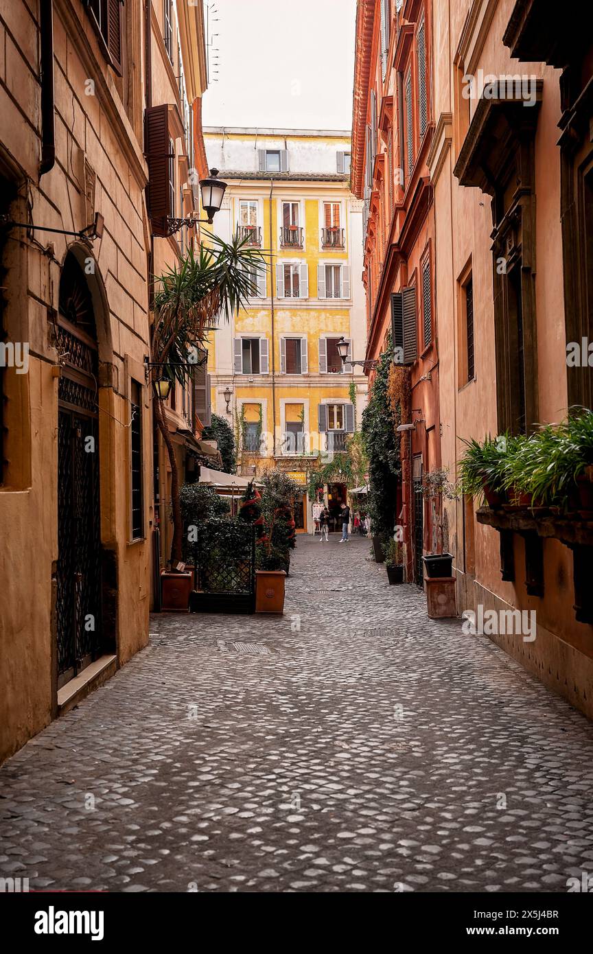 Quaint cobblestone street in historic Rome, Italy Stock Photo - Alamy