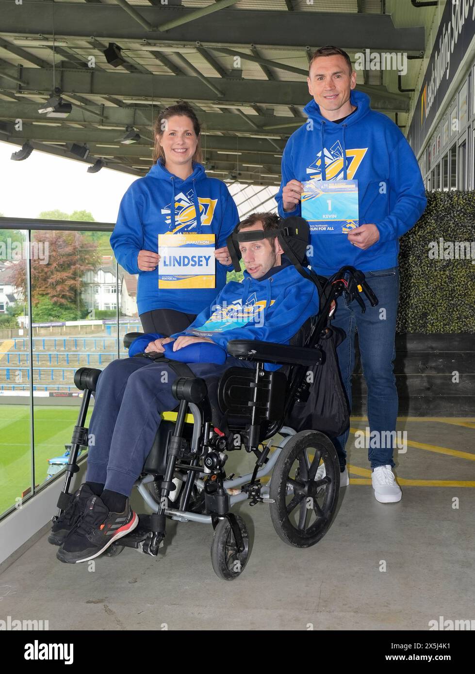Rob Burrow (centre) with his wife Lindsey Burrow and Kevin Sinfield ...