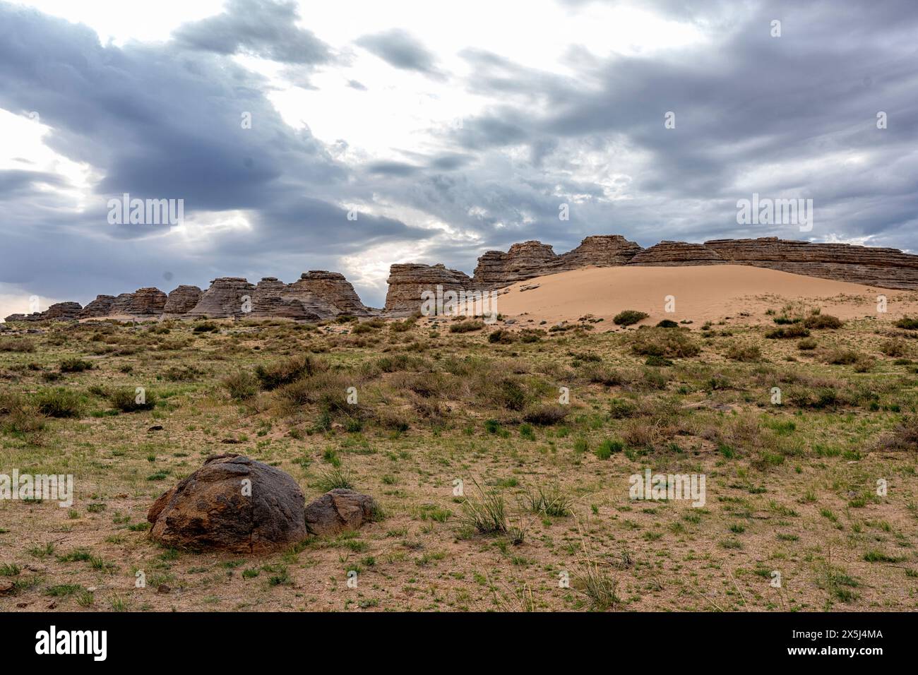 Asia, Mongolia, Eastern Gobi Desert. Rock formations abound with small ...