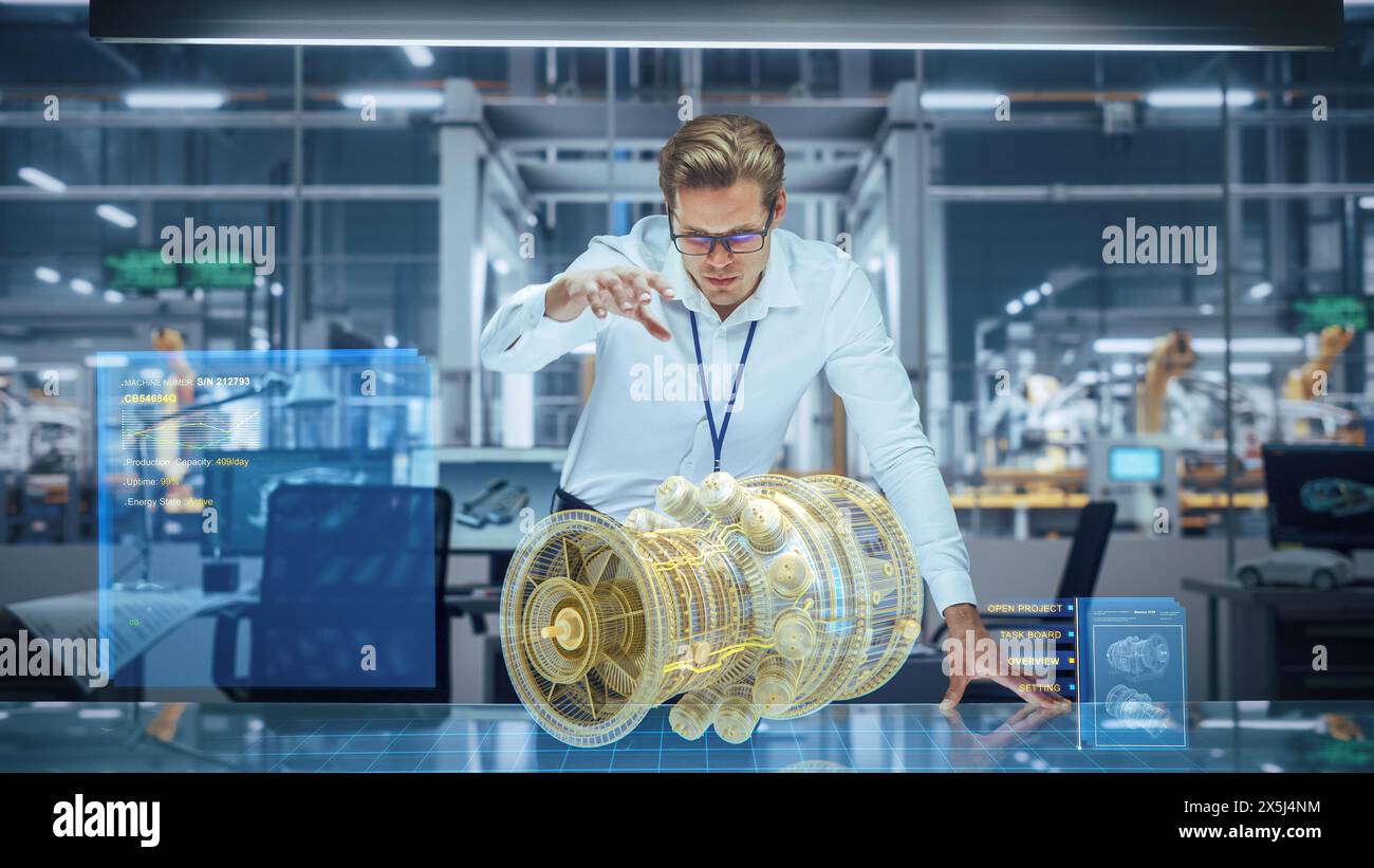 High-Tech Industry: Engineer Designing 3D Engine, Using Augmented Reality Hologram Table to ...