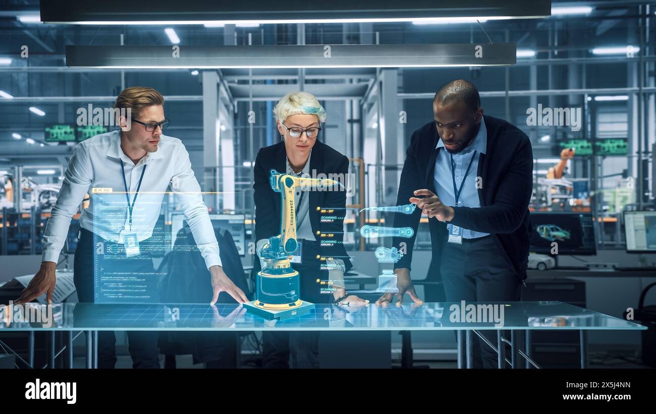 Industry 4.0 High-Tech Factory: Diverse Team of Robotics Engineers Working on Robot Arm Design ...