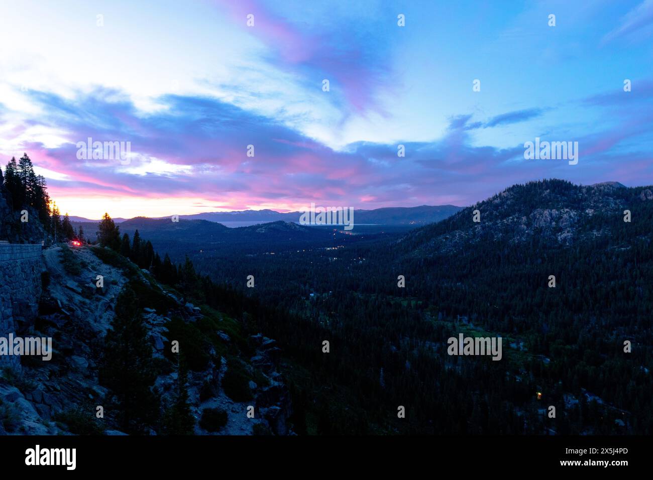 Stunning sunset over mountains, casting vibrant twilight hues Stock ...