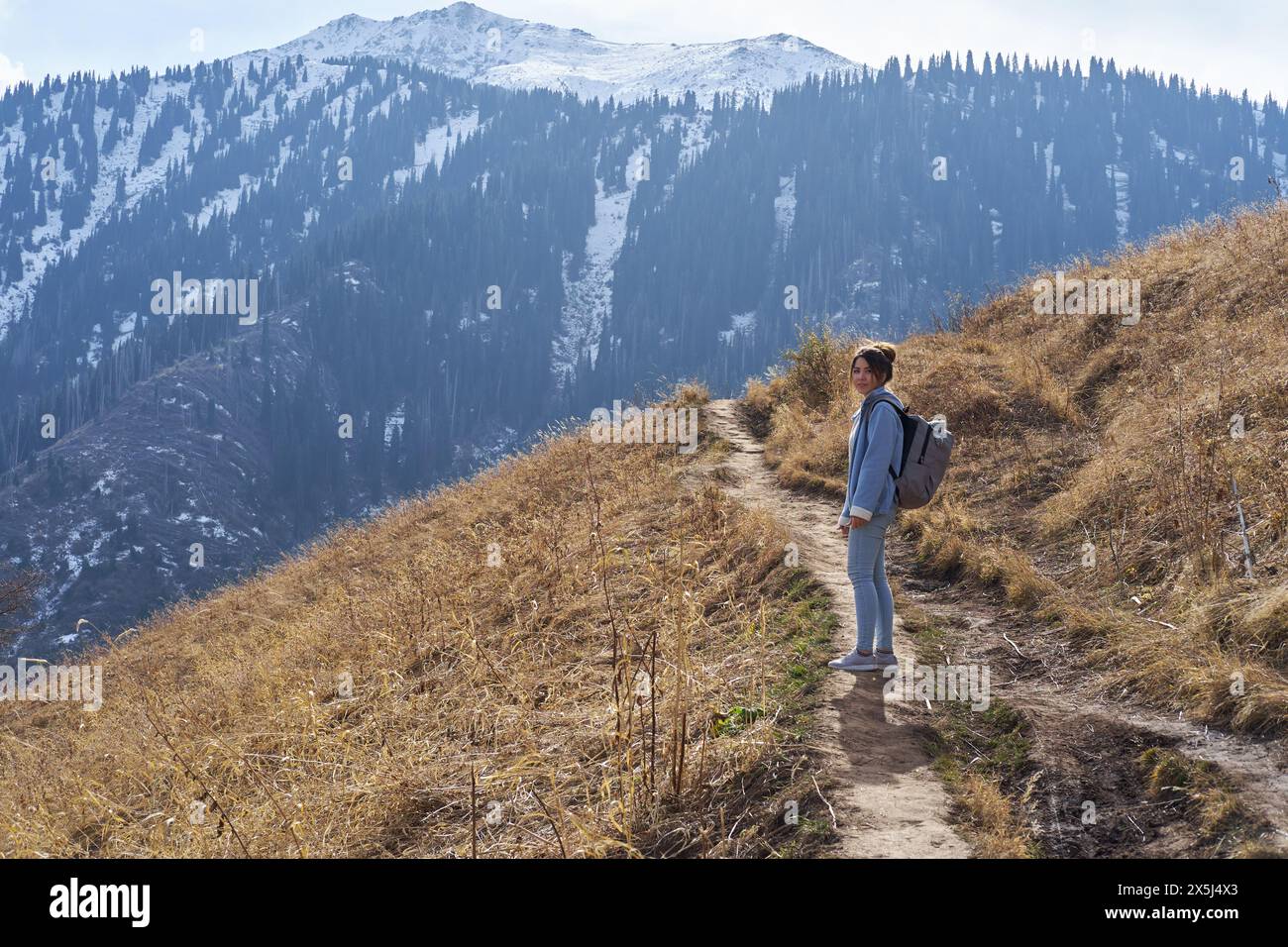 Woman enjoy autumn walking along hi-res stock photography and images ...