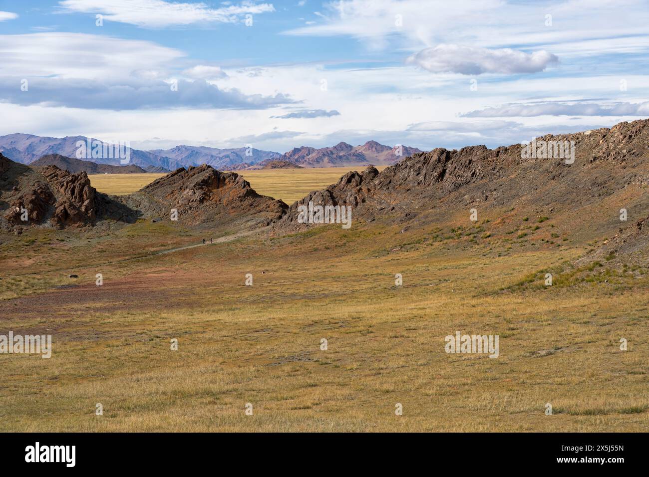 Asia, Mongolia, Bayan-Olgii Province. Rugged, rocky hills interspersed ...