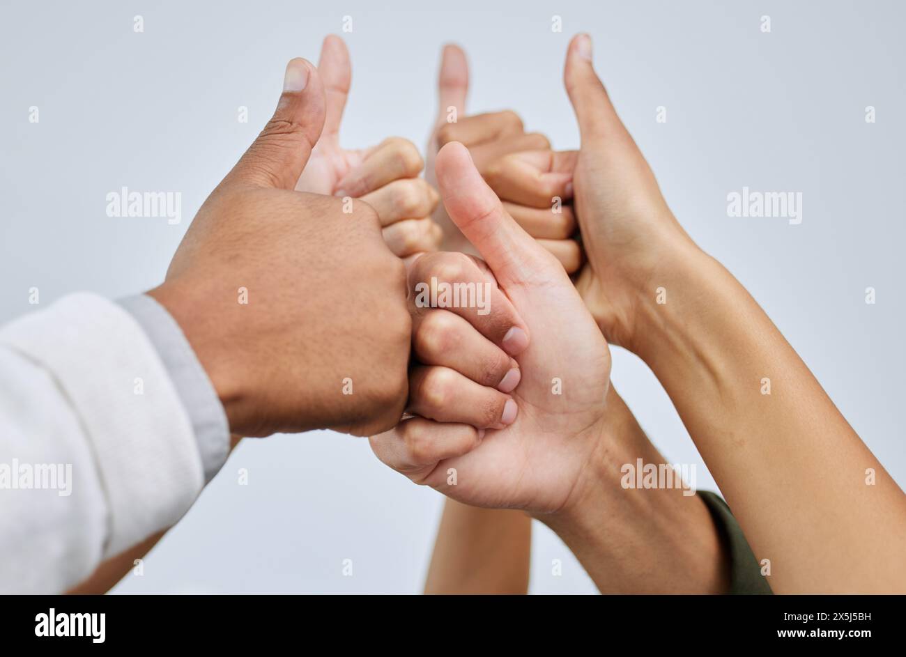 Thumbs up, winning and team of people in studio with unity ...